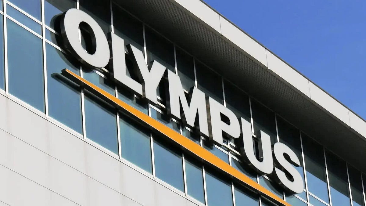 OLYMPUS. Olympus Corporation was established on… | by Yang Anis ...