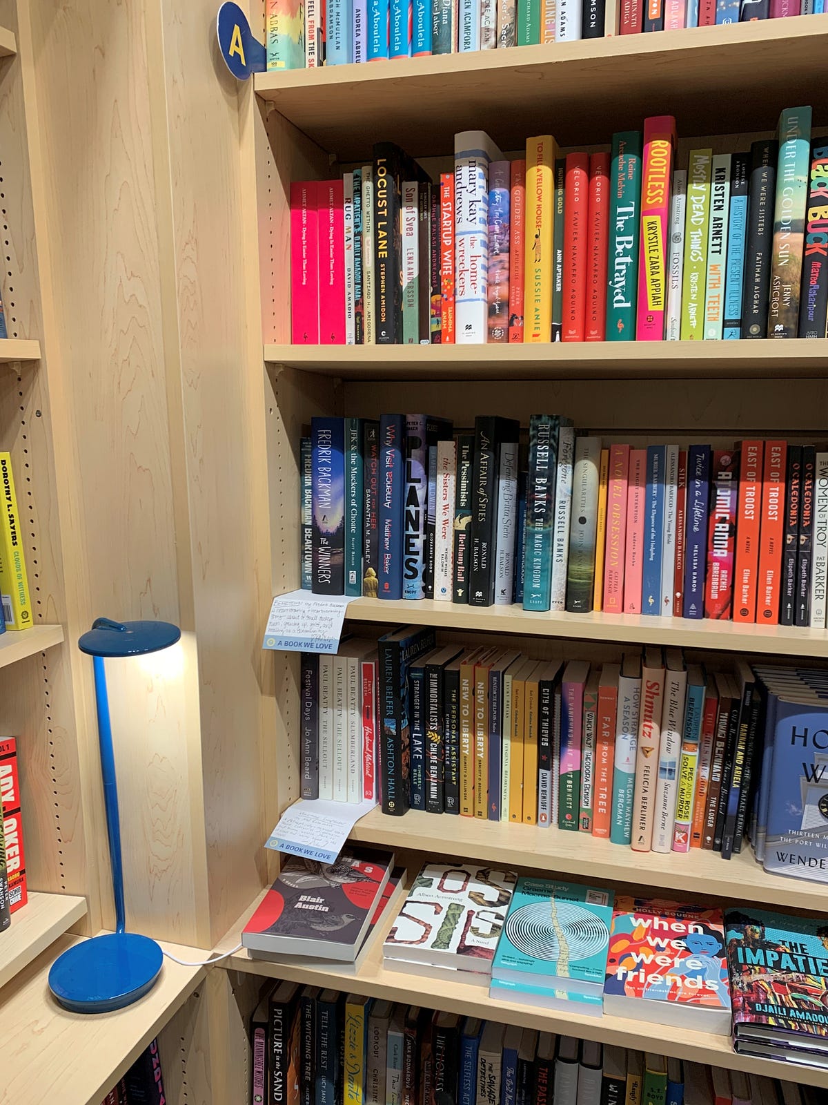 By the light of a bookshop. The day’s thick, gray gloom just wasn’t ...