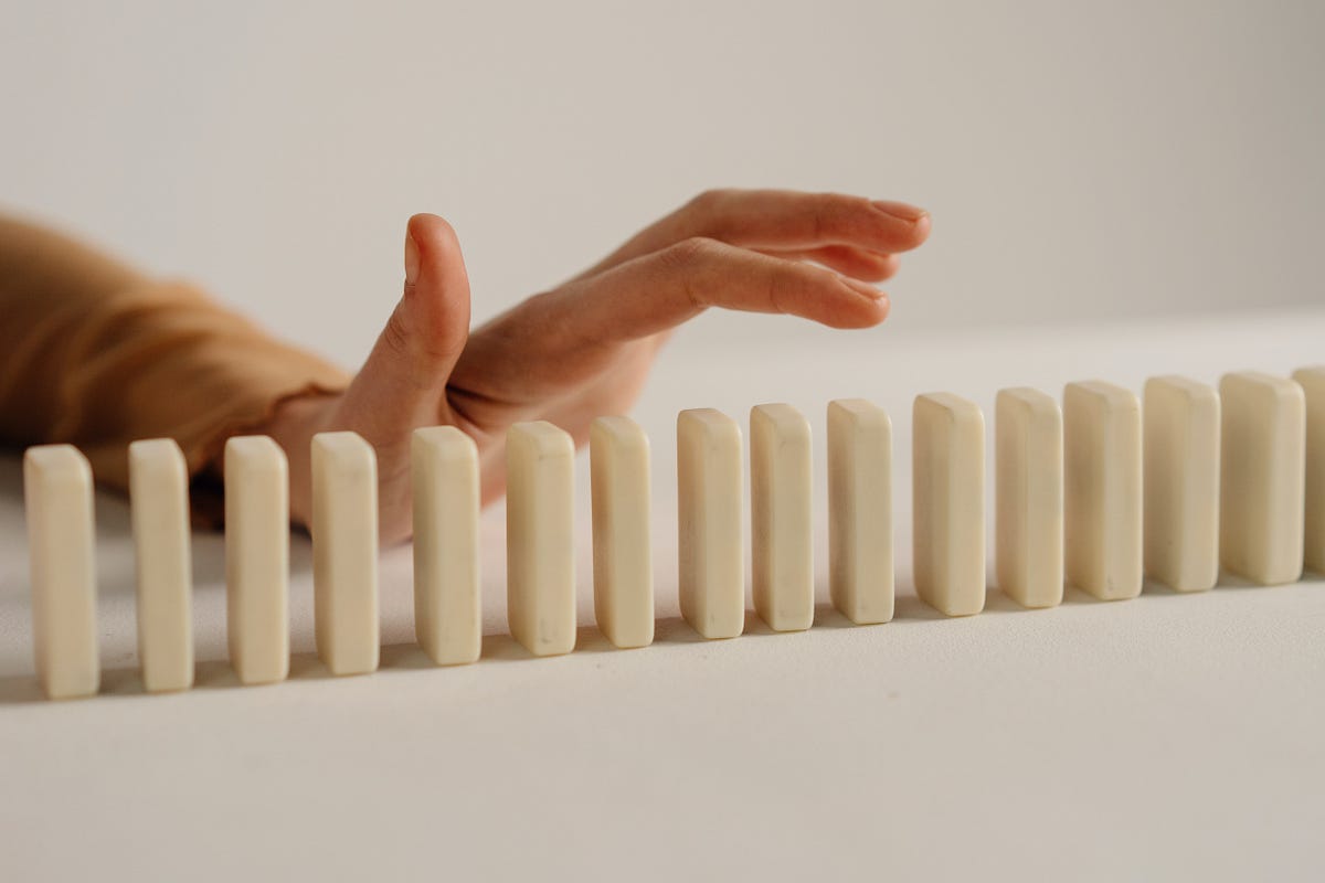 Decoding Life’s Domino Effect: How Our Actions Propel Us Toward Success ...