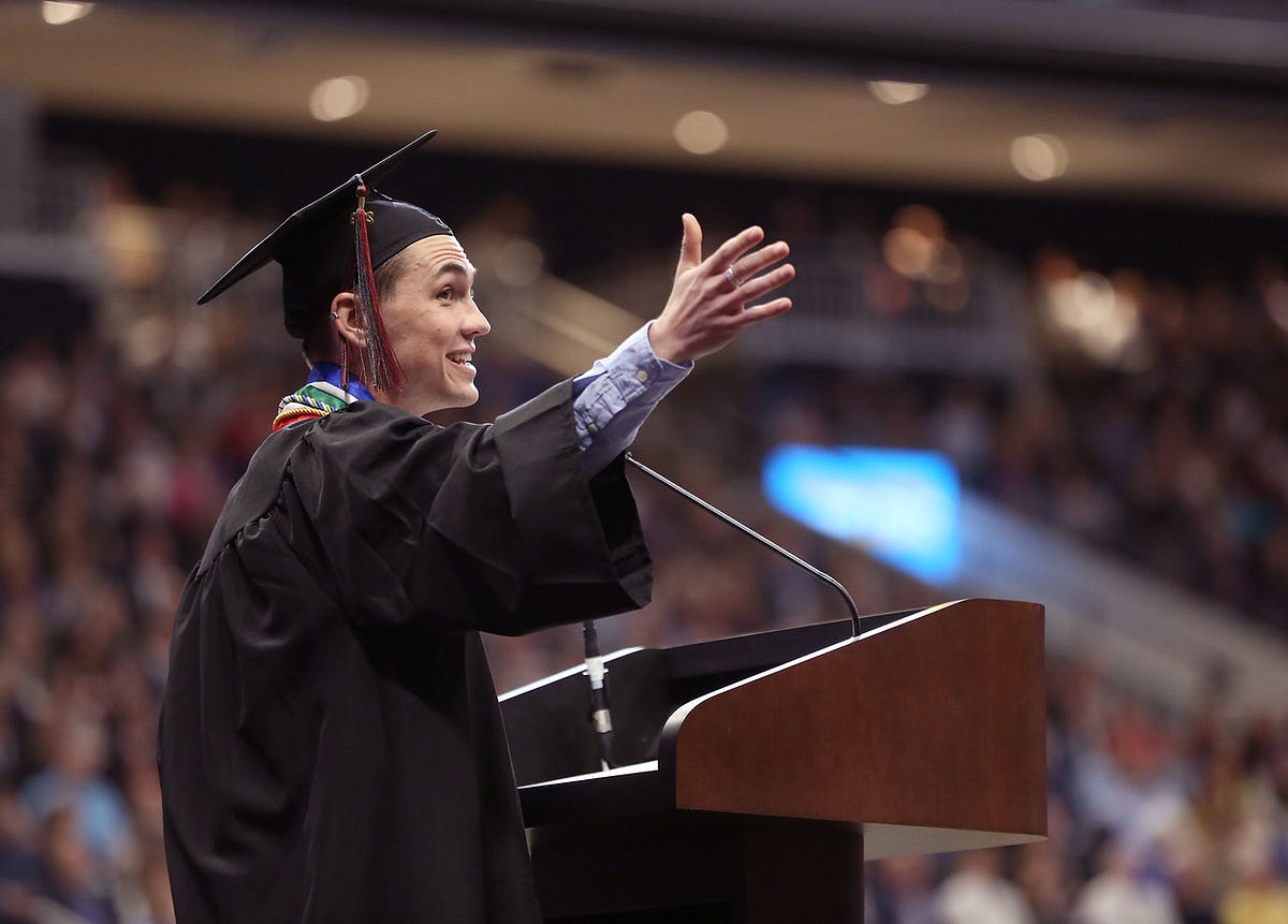 With a cap and gown and broken heart | by Marquette University | We Are ...