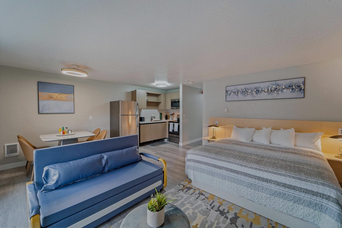 Experience Comfort and Style in Our Studio King Suite with Full Sofa ...