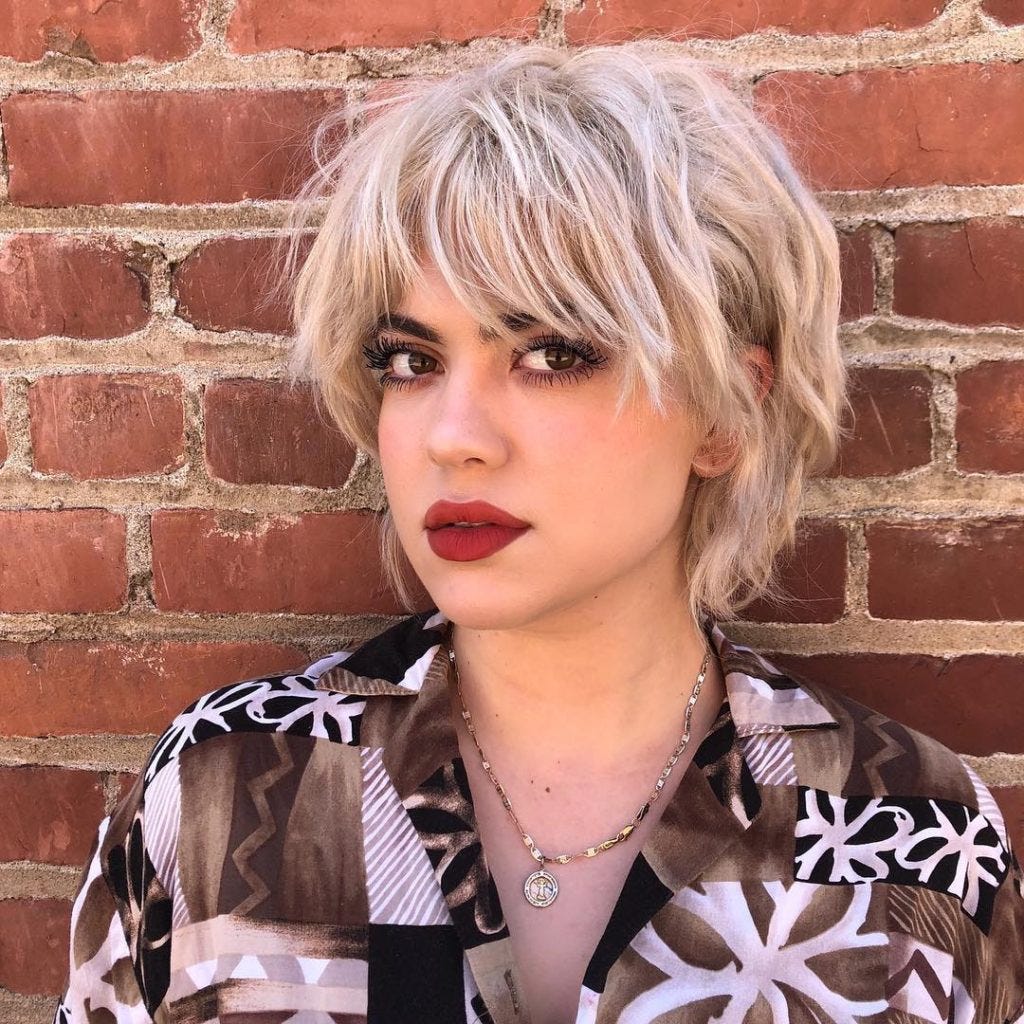 Sexy Layered Bob With Curtain Bangs And Undone Wavy Texture With Balayage By Hairstyleology