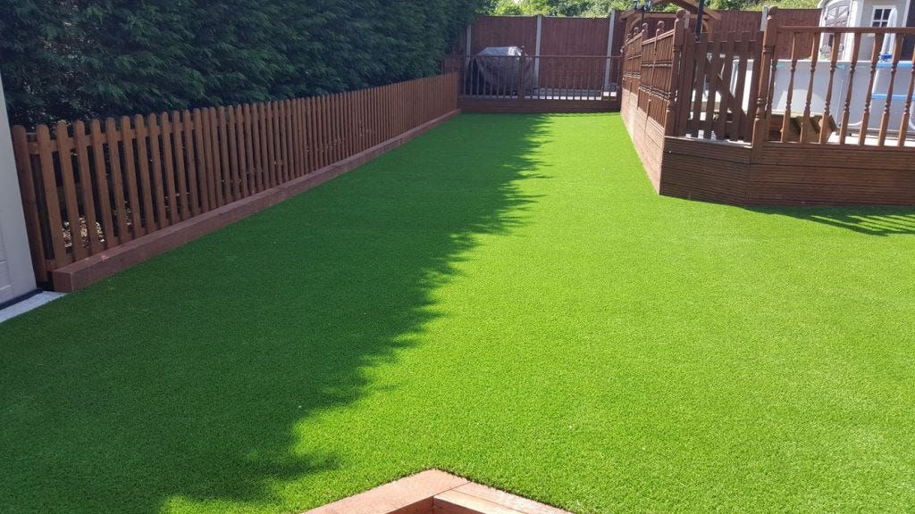 Artificial turf grass. is a synthetic, man-made alternative to… | by ...