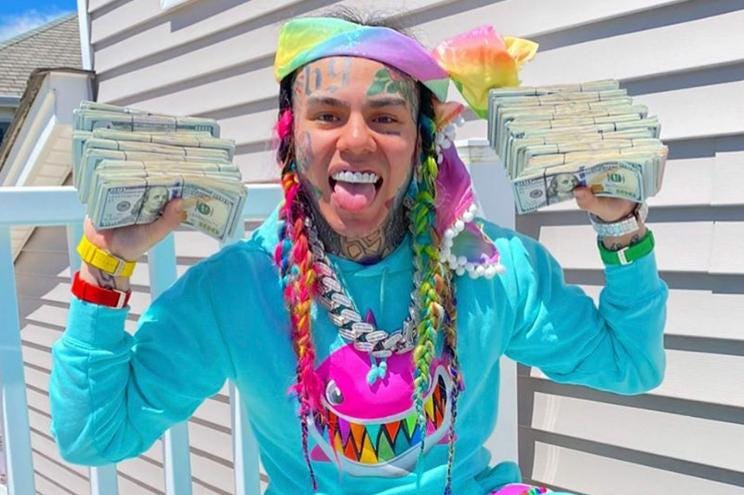 Rappers Holding Money