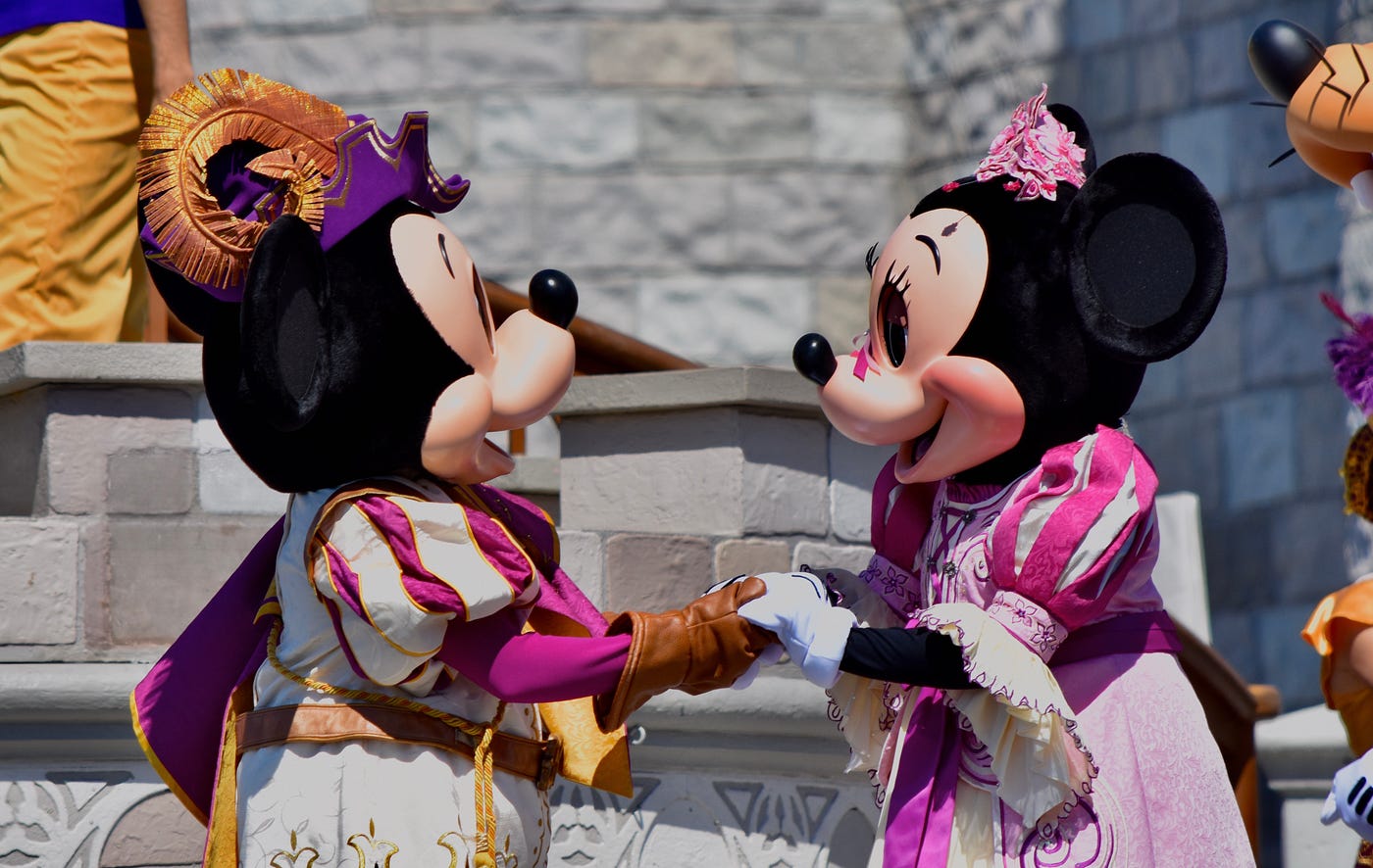 Minnie And Mickey Mouse Holding Hands Cartoon