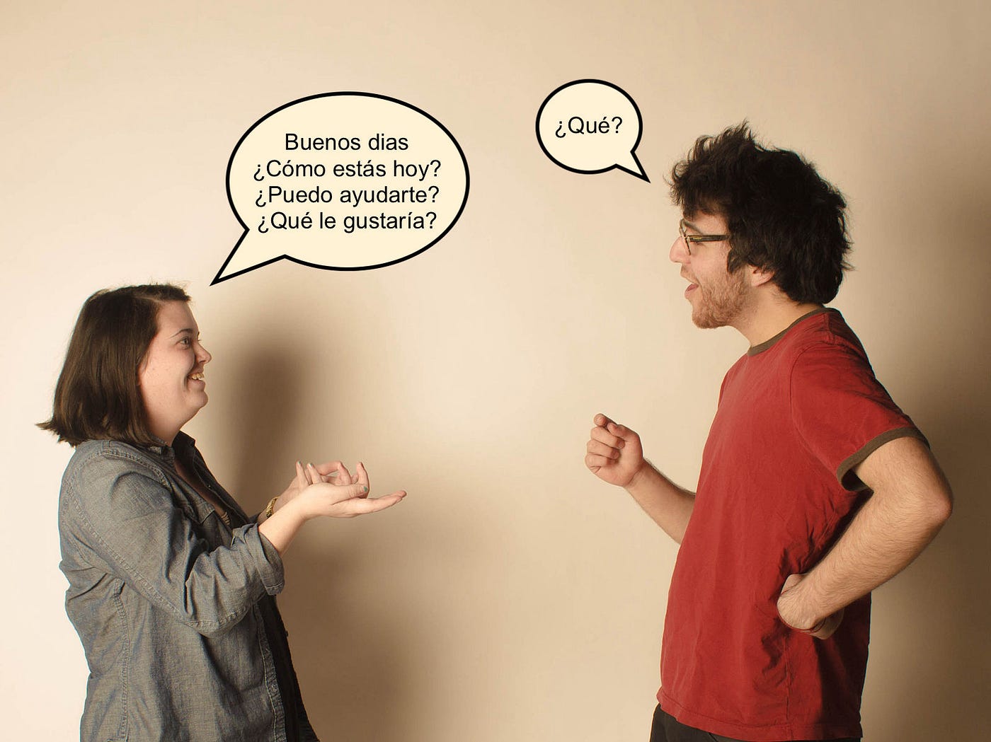 Two People Talking To Each Other In Spanish