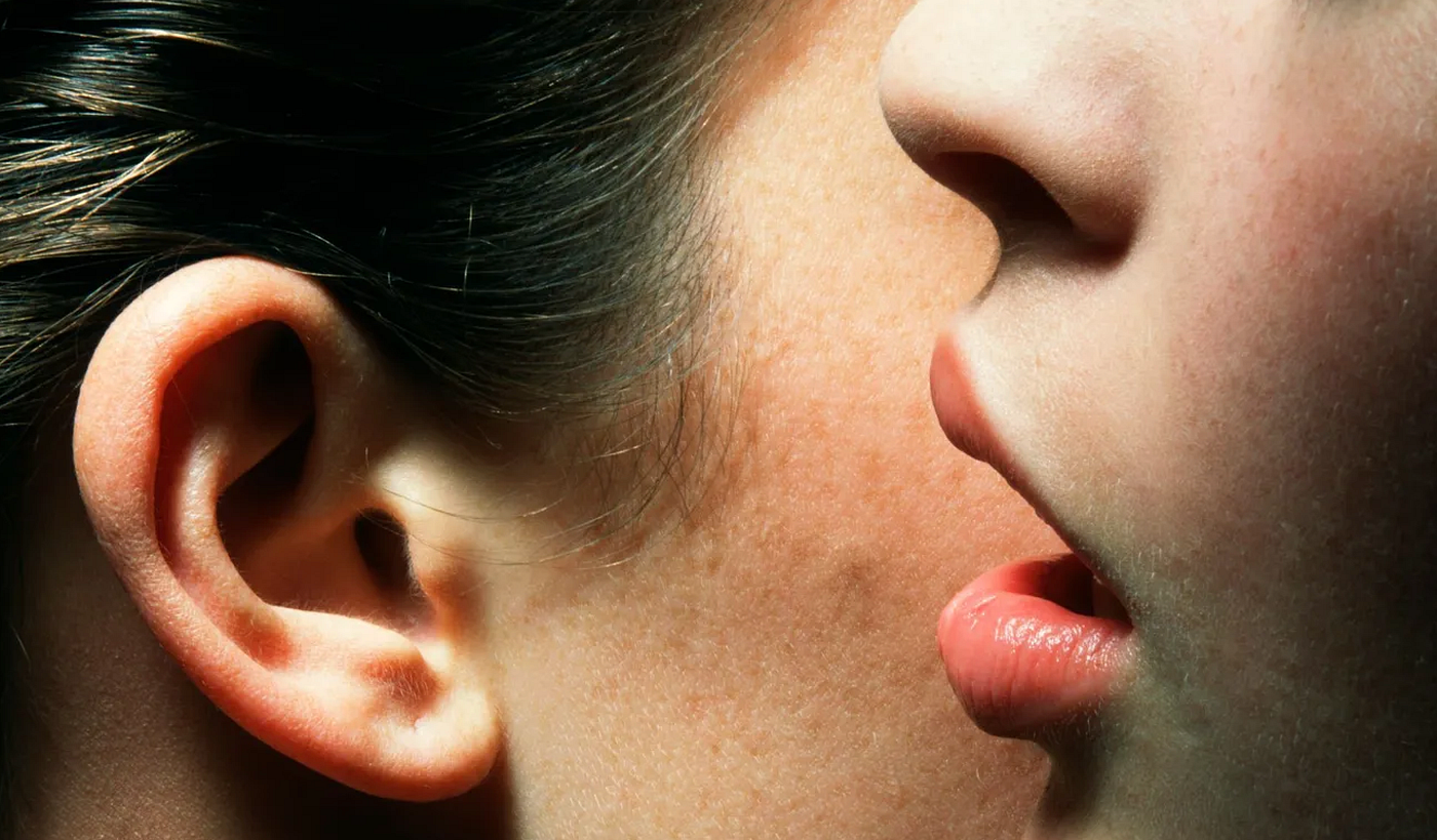 Whispering In His Ear