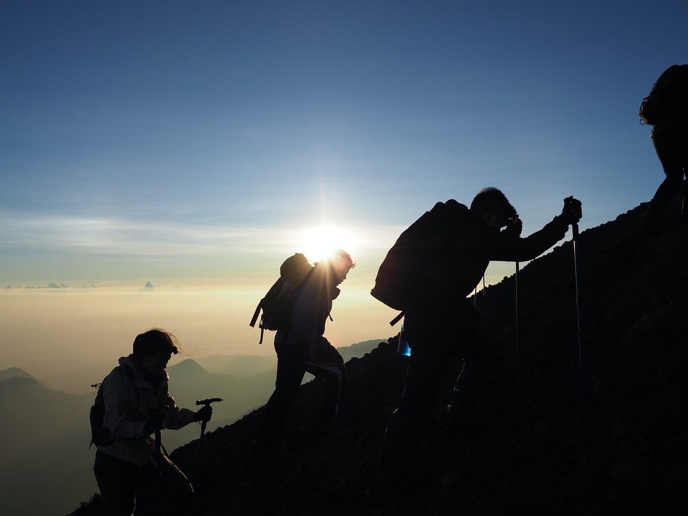 People Climbing Mountains
