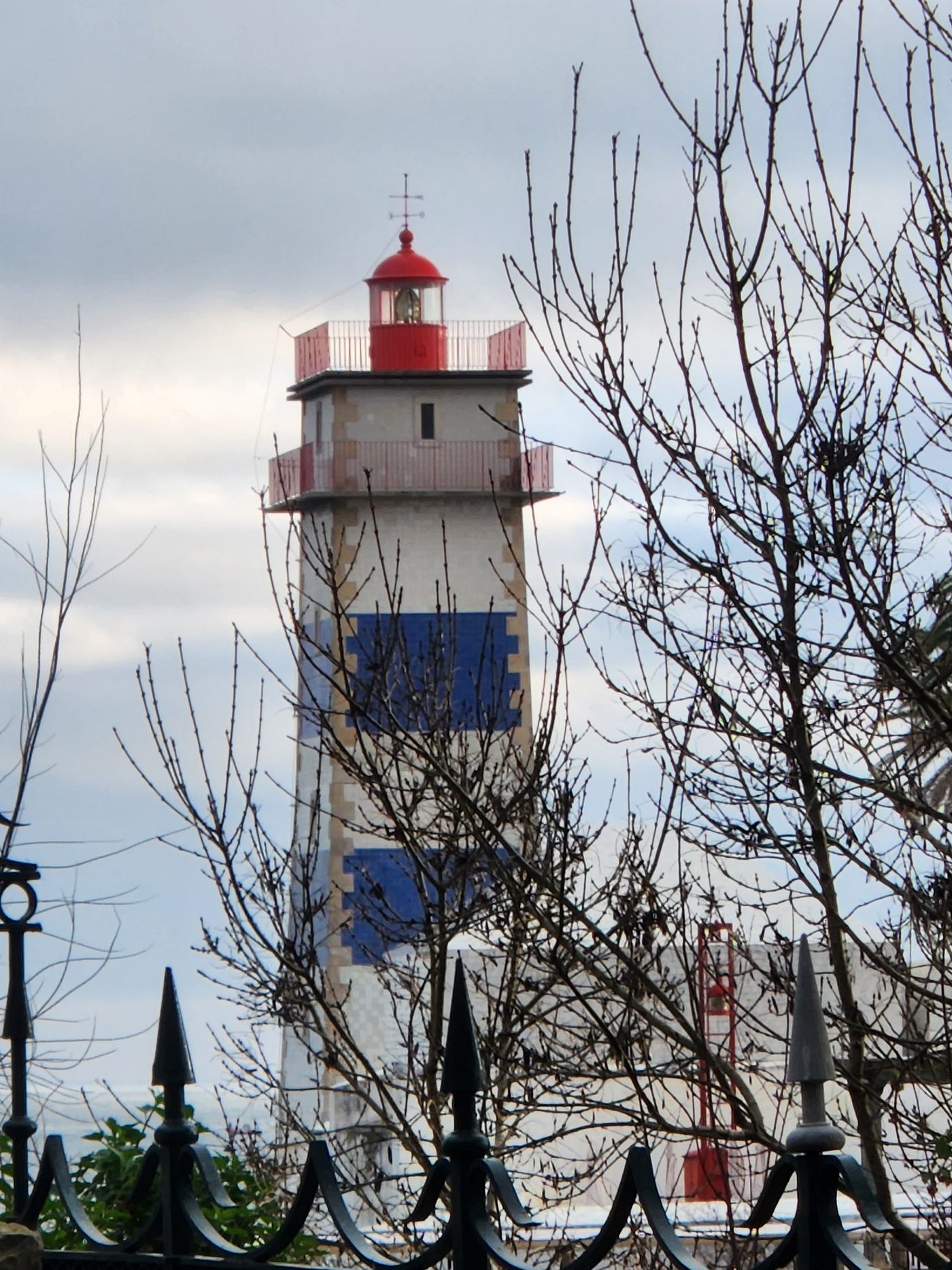 Lighthouse On Top Of Fence