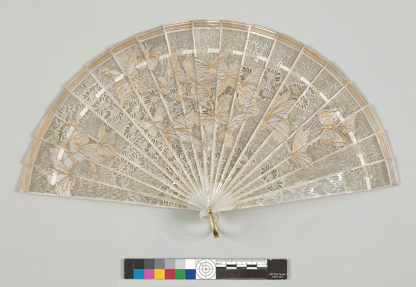 French Hand Fan Meticulously Mending Fragments Of A Fan | By Cleveland