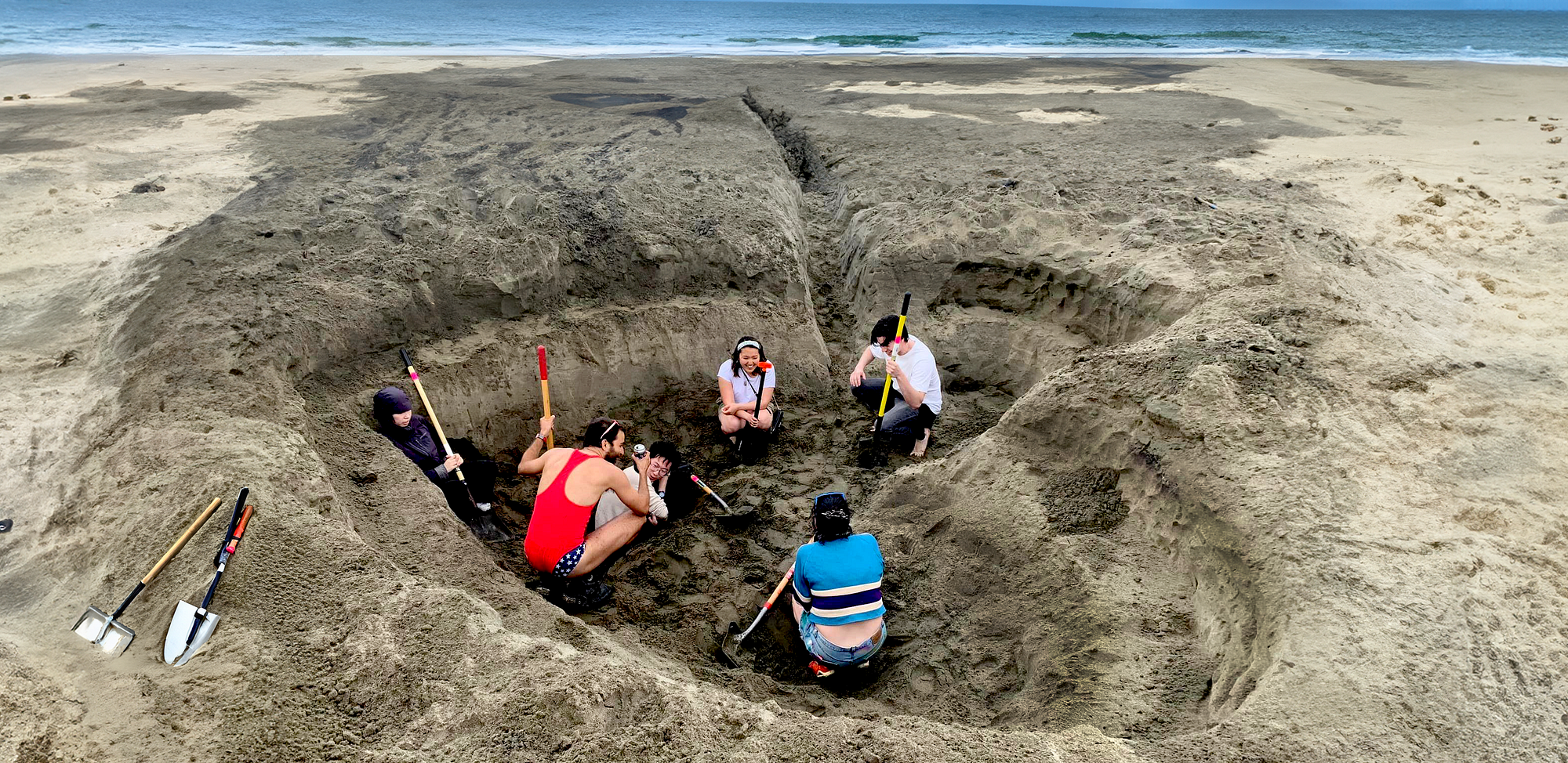 Digging A Hole At Beach