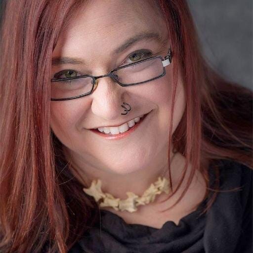 Nikki D. May – Medium