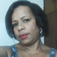 Nívia Menezes – Medium
