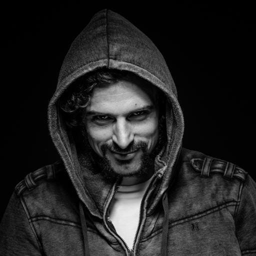 Brett Scott – Medium