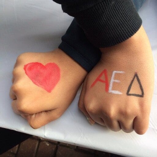 Alpha Epsilon Delta – Medium