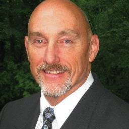 John Logan – Medium