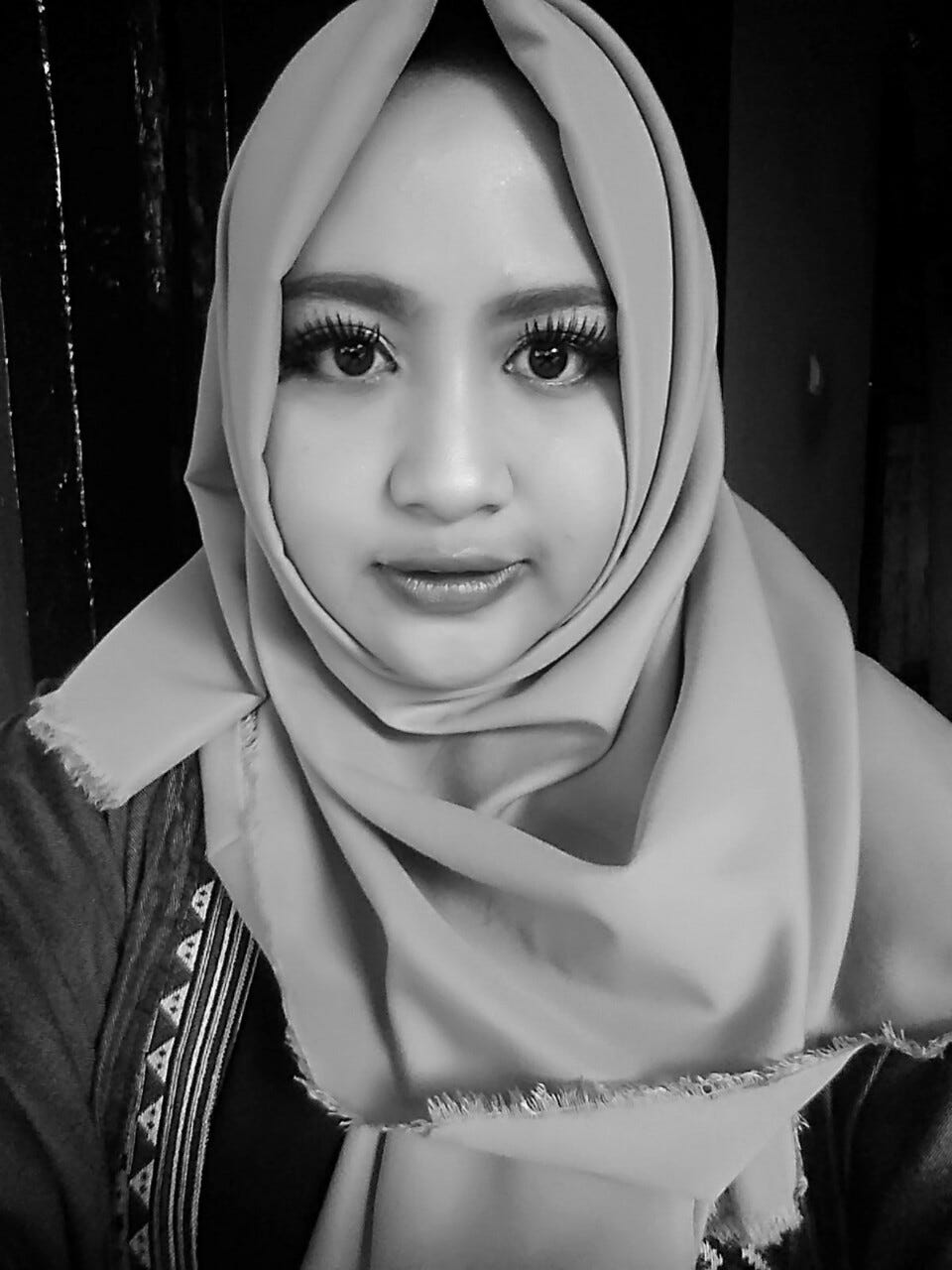 Hujan Bulan Yuli – Medium