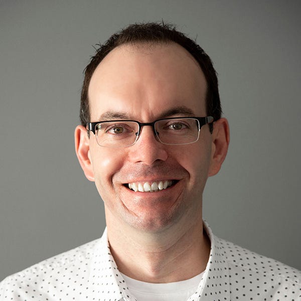 Andrew J. Fisher – Medium