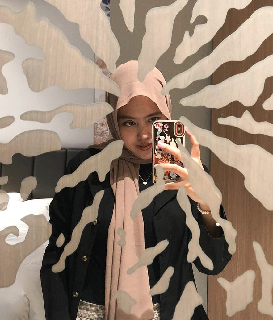 Niken Ayu Febriani – Medium