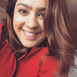 Emmy Singh – Medium