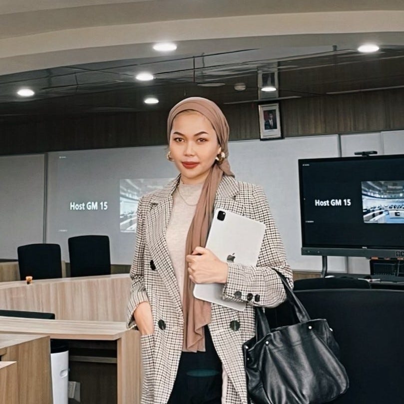 Rina Adibah – Medium