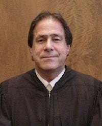 Judge Mark W. Bennett – Medium