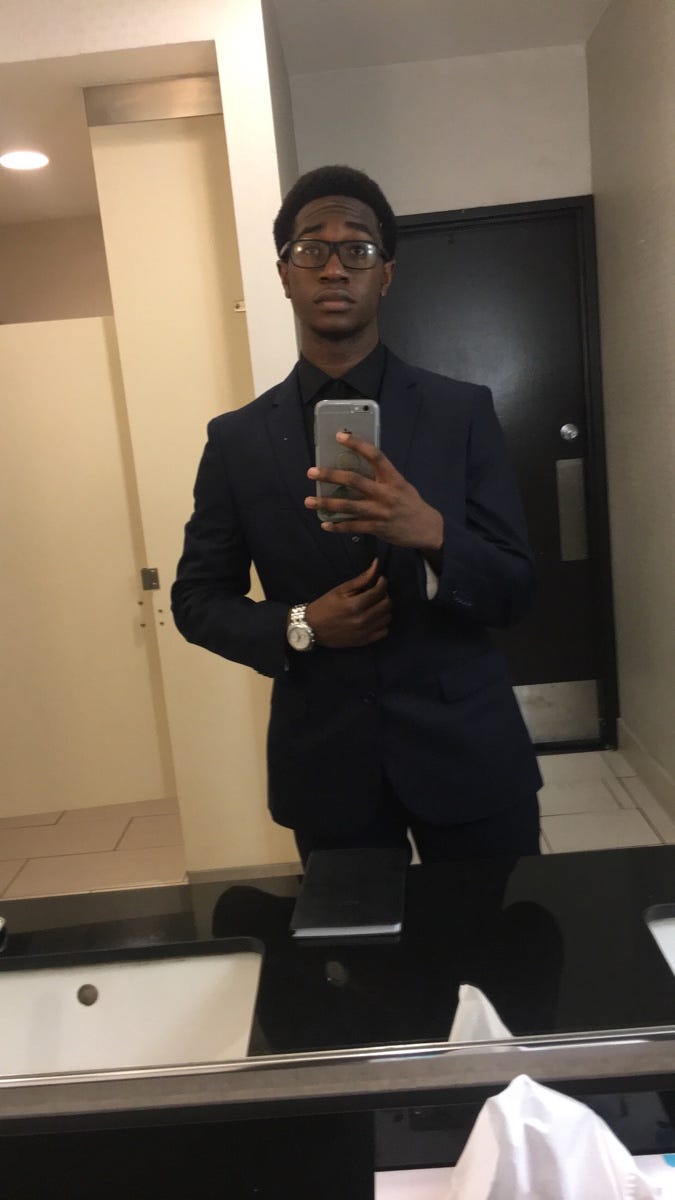 Michael Adubi – Medium