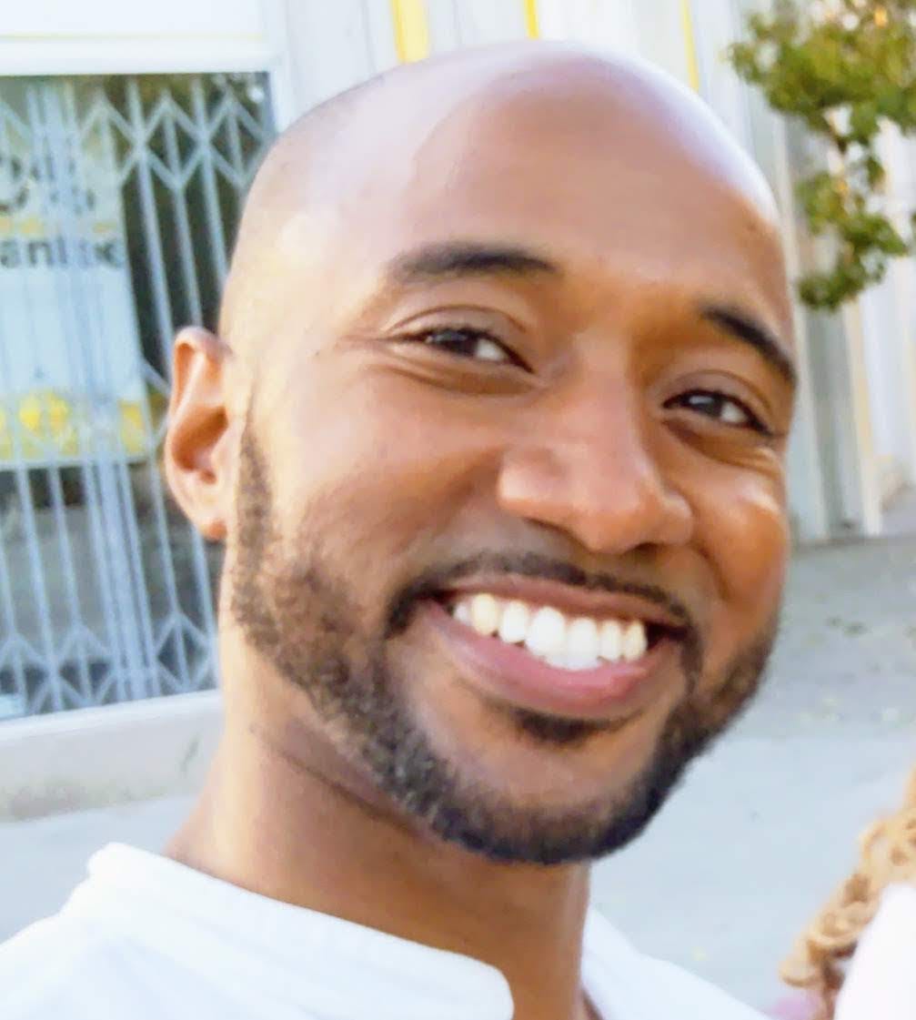 Conrad Davis Jr. – Medium