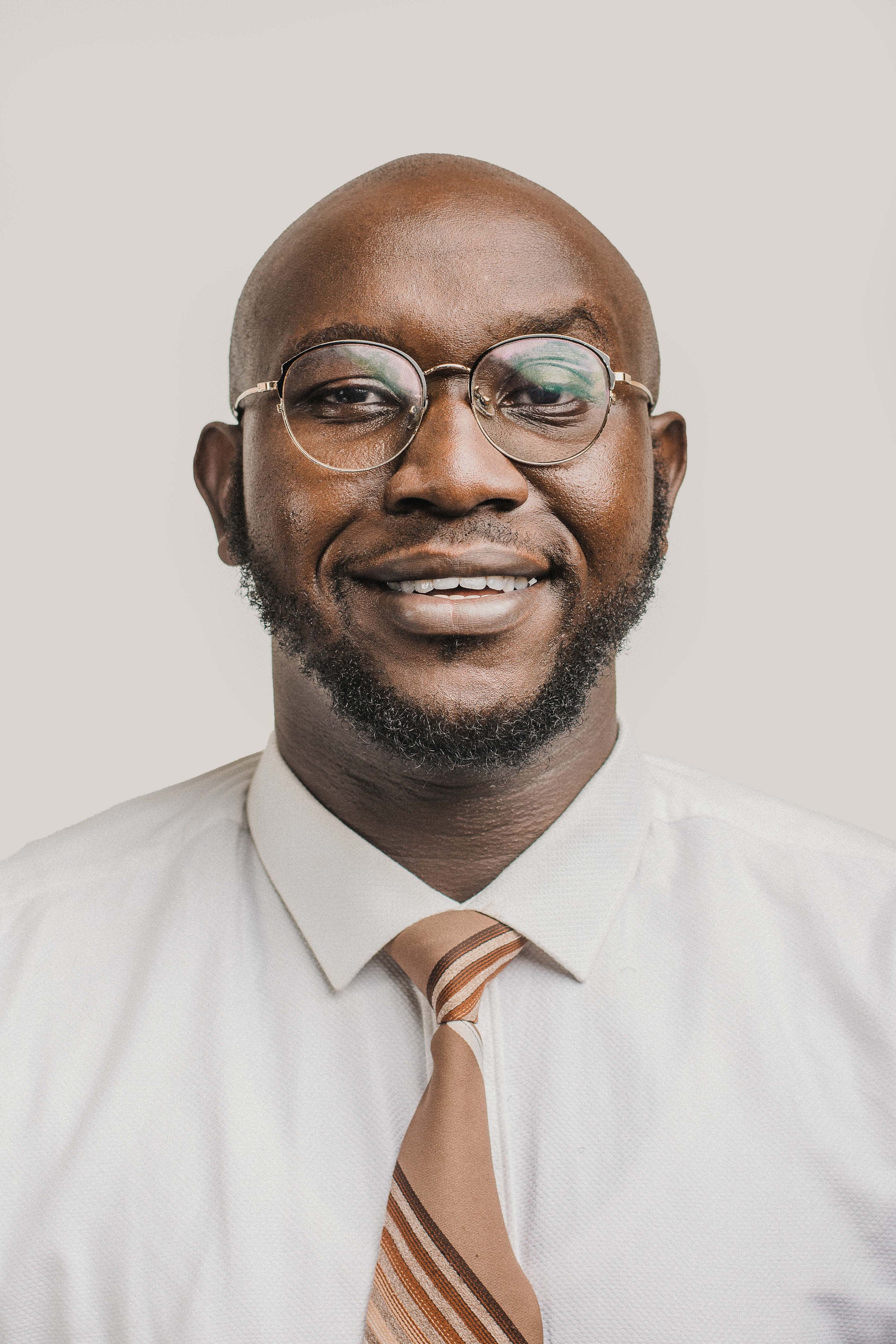About – Mickey Okot Kiwanuka – Medium