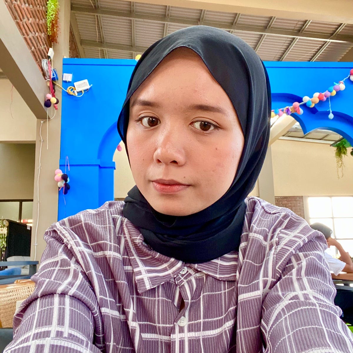 Ria Nurafni – Medium