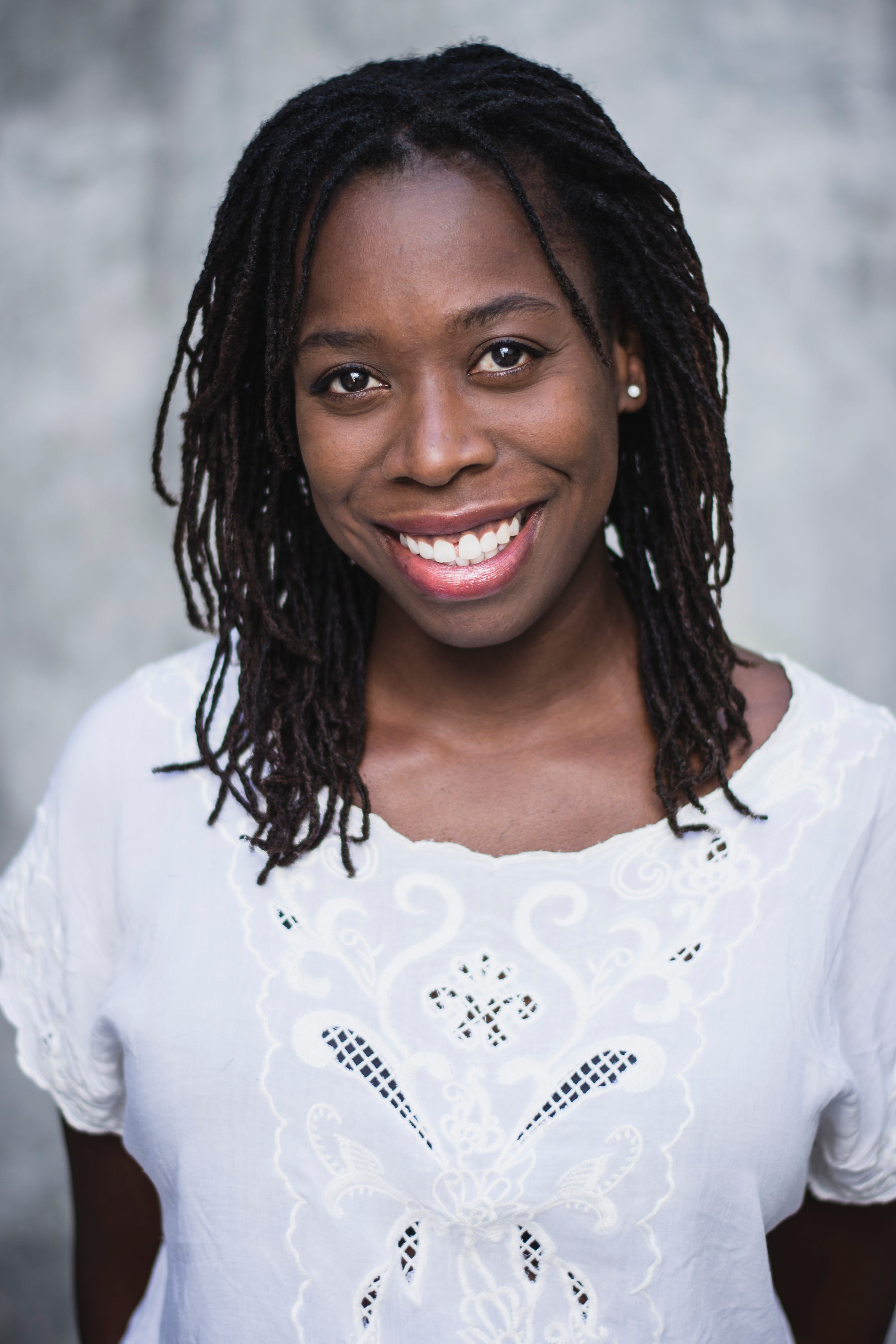 Dr. Kenya Mitchell – Medium