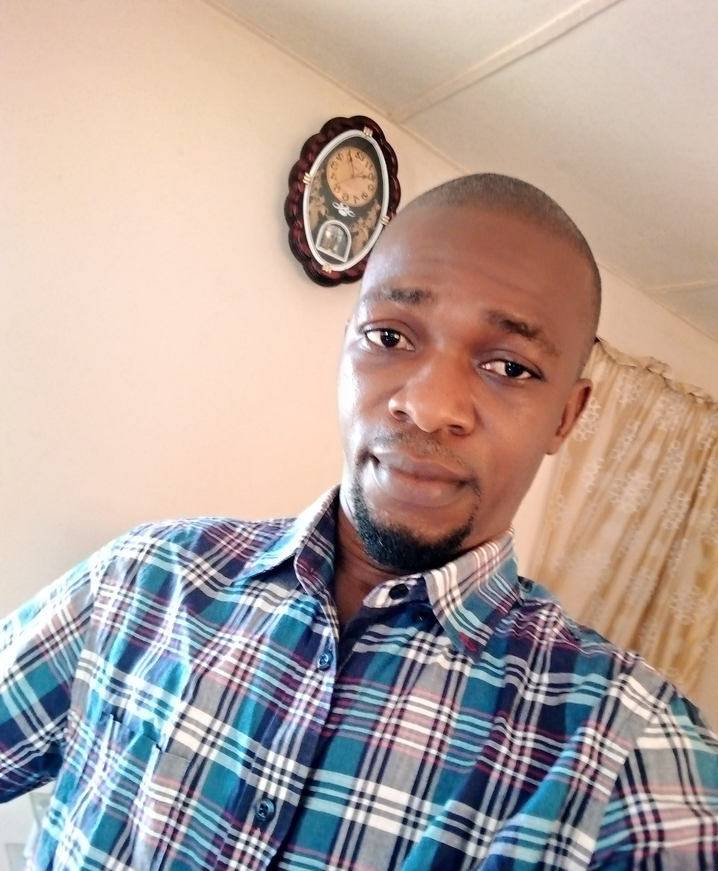 Sampson Solomon Etteh – Medium