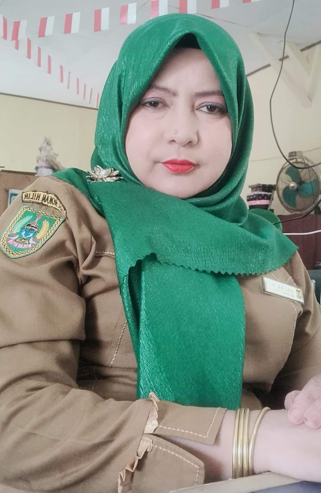 ERLINA,S.Pd.,Gr. – Medium