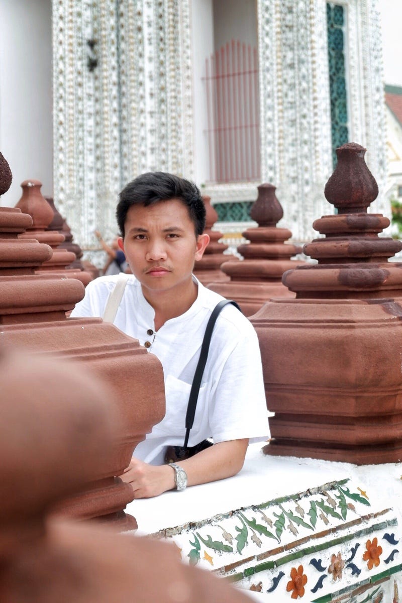 Neil John Sumalinog – Medium