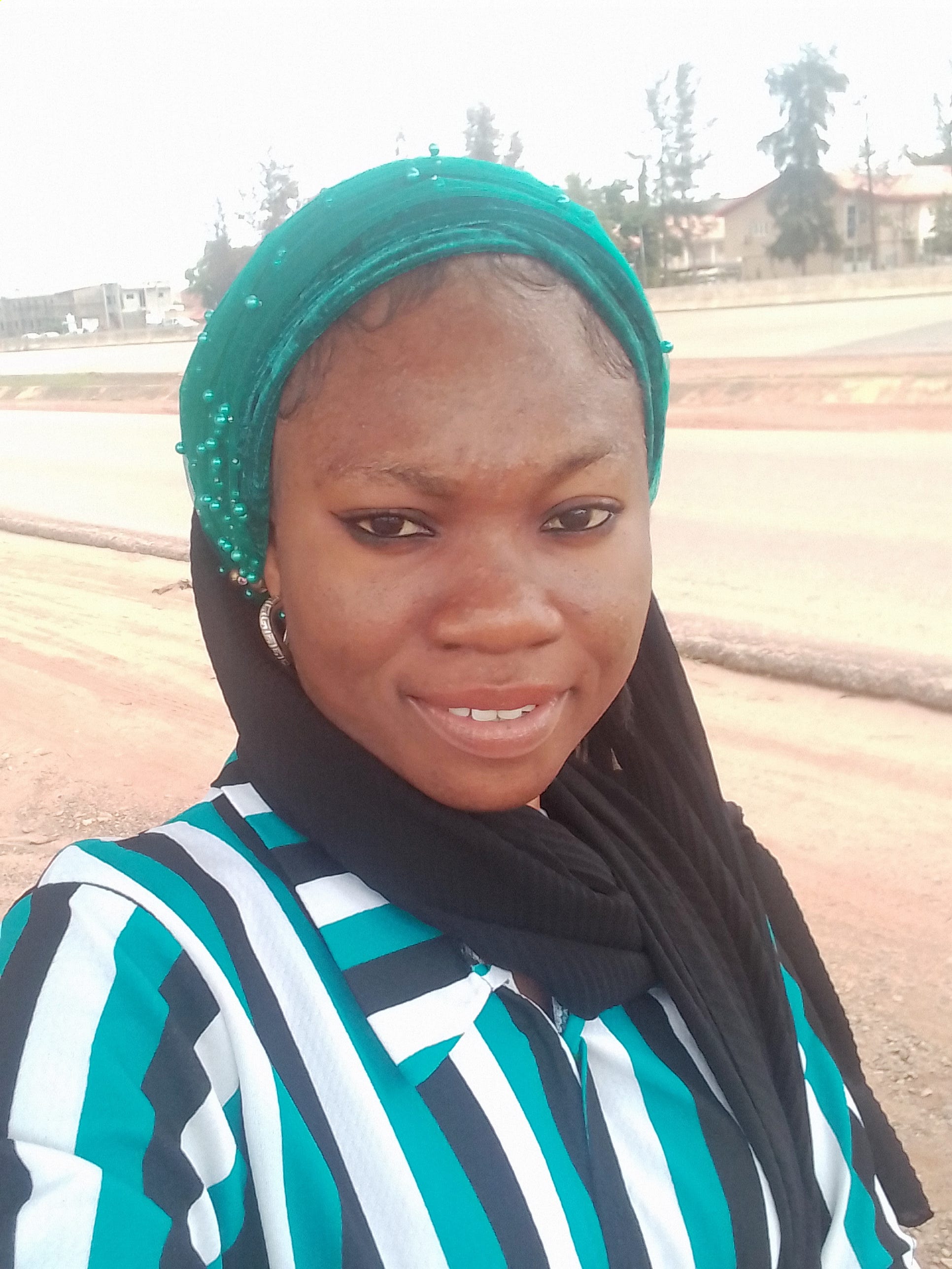 Khadijah Adebisi A – Medium