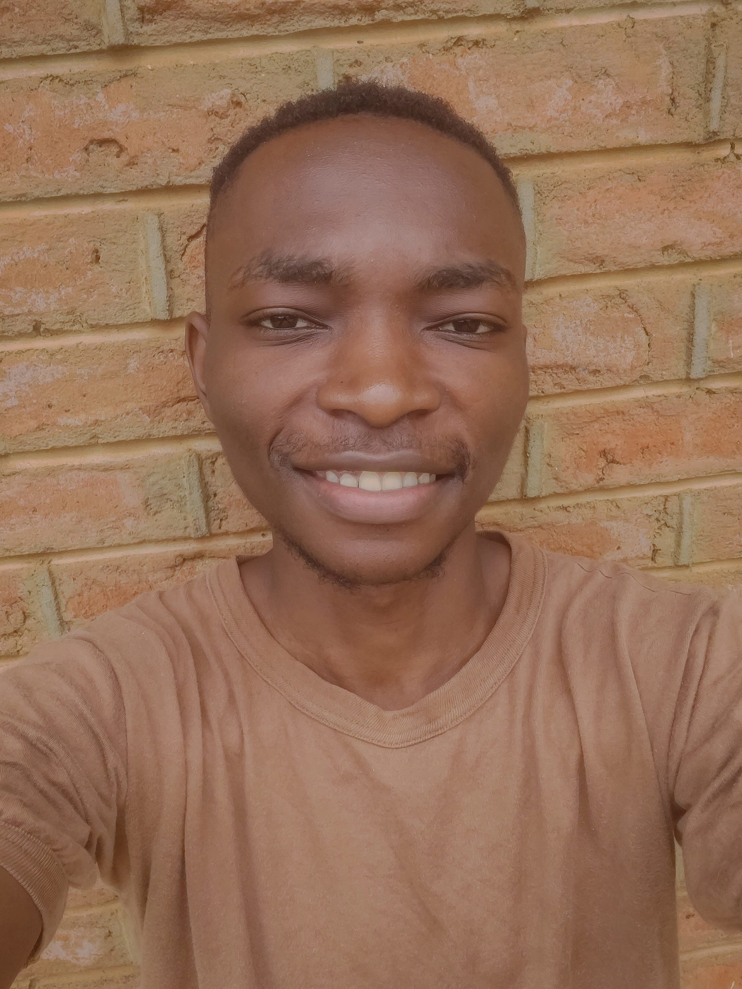 Chris Kamwana – Medium