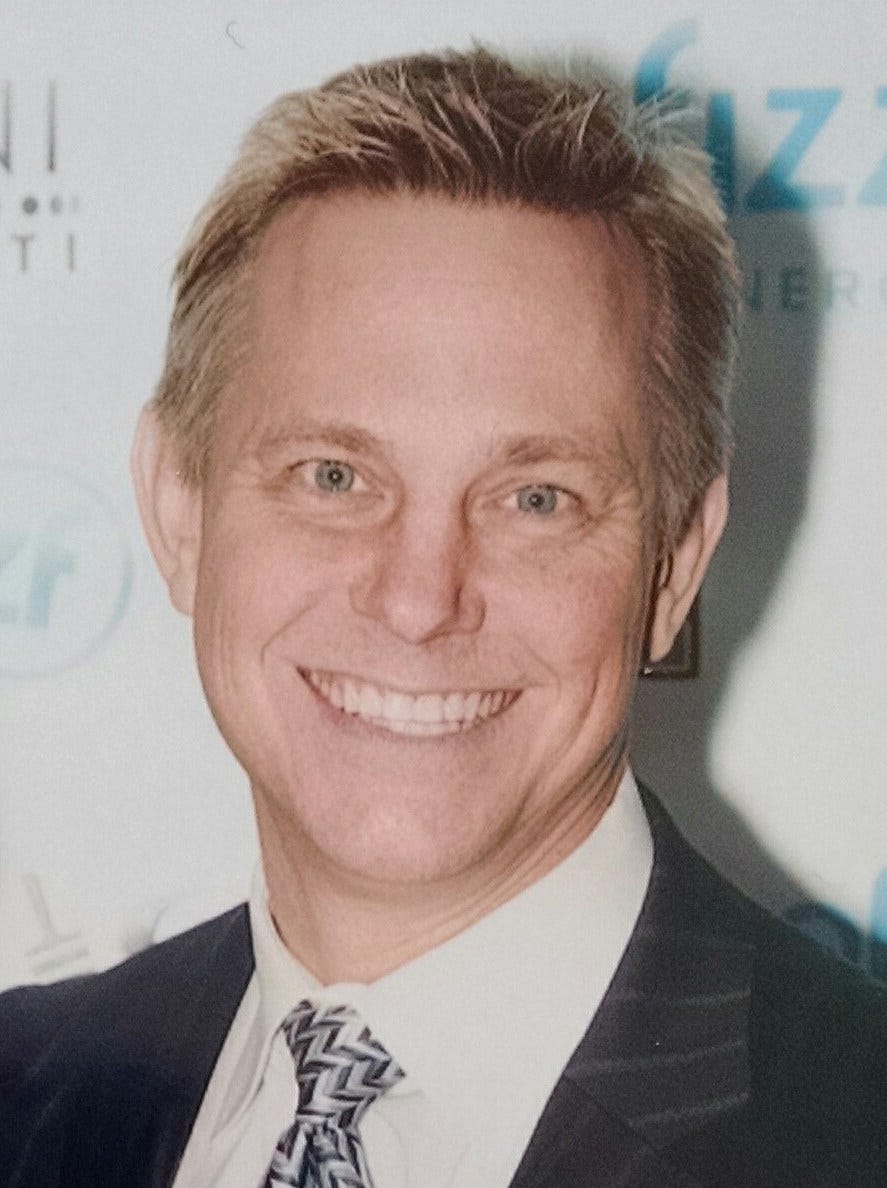Scott Greenlaw – Medium