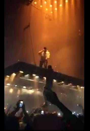 Secret Eyes on Pop Culture: Fan Climbs on Kanye West’s Floating Stage ...
