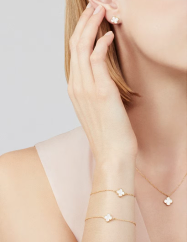 Embracing Originality: Handmade Charm Bracelets with Clover Details ...