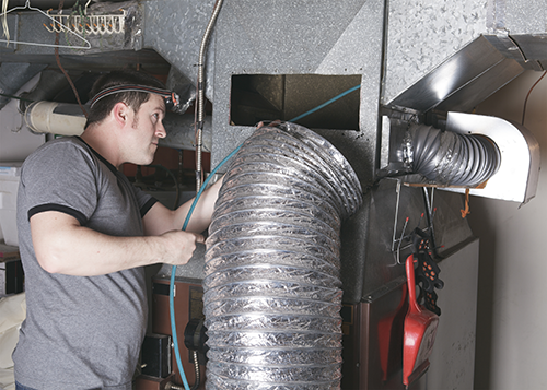What Causes Air Ducts to Pop?. Air Duct Cleaning Aurora — Sitting in a ...