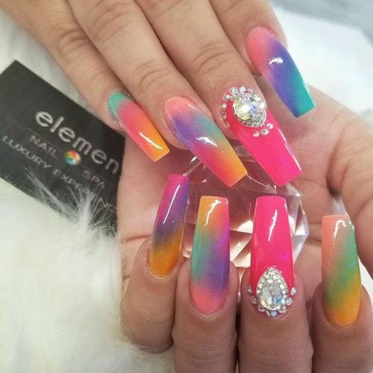 Adorn your nails with SNS manicure done by beauty experts from a salon ...