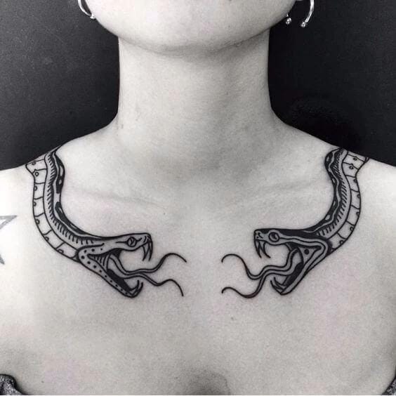 Snake wrapped around collarbone tattoo | Orangetattooshop.com