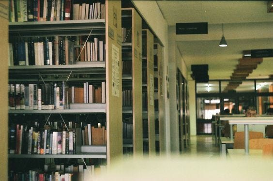 CHAPTER 6 — THE CORNER TABLE. Where Cassandra realizes the library is ...