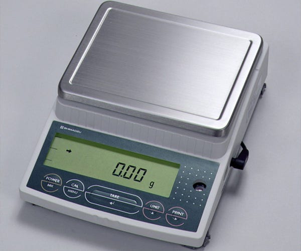 PRECISION AND ANALYTICAL WEIGHING BALANCES IN THE VIEW OF A WEIGHING ...