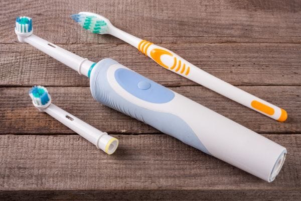 How to clean an electric toothbrush: complete guide - Purl Oral Care ...