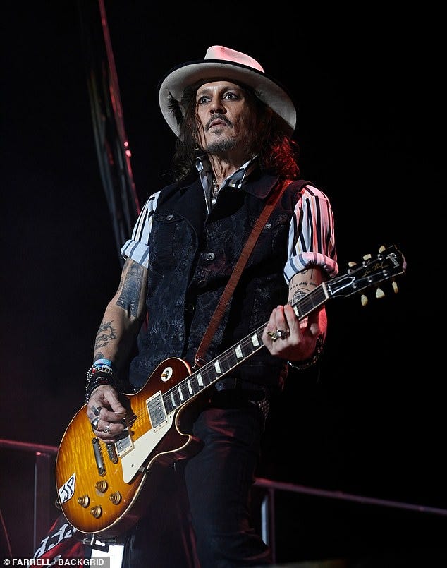 Johnny Depp performs on stage with his rock band Hollywood Vampires in ...