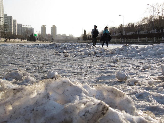 Beijing Advises Umbrellas to Shield Against Its Gross Snow | by Newser ...