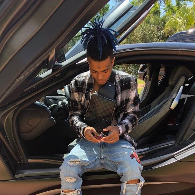 Small writing about XXXTENTACION. The words which are in Bold letters ...