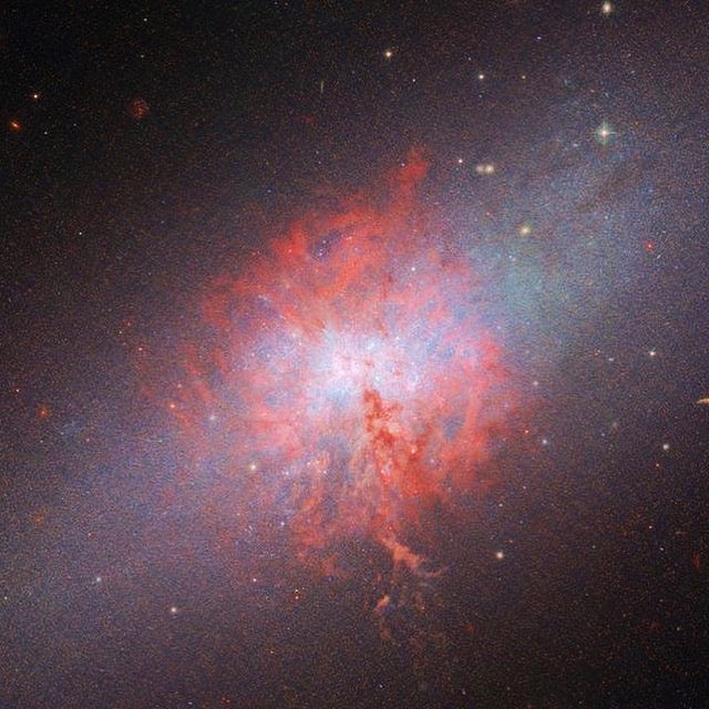 Blue compact dwarf galaxy NGC 5253 | by SpaceInfo Club | Jun, 2024 | Medium