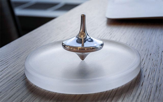 ForeverSpin Titanium Spinning Top | by Idiot Buy | Medium